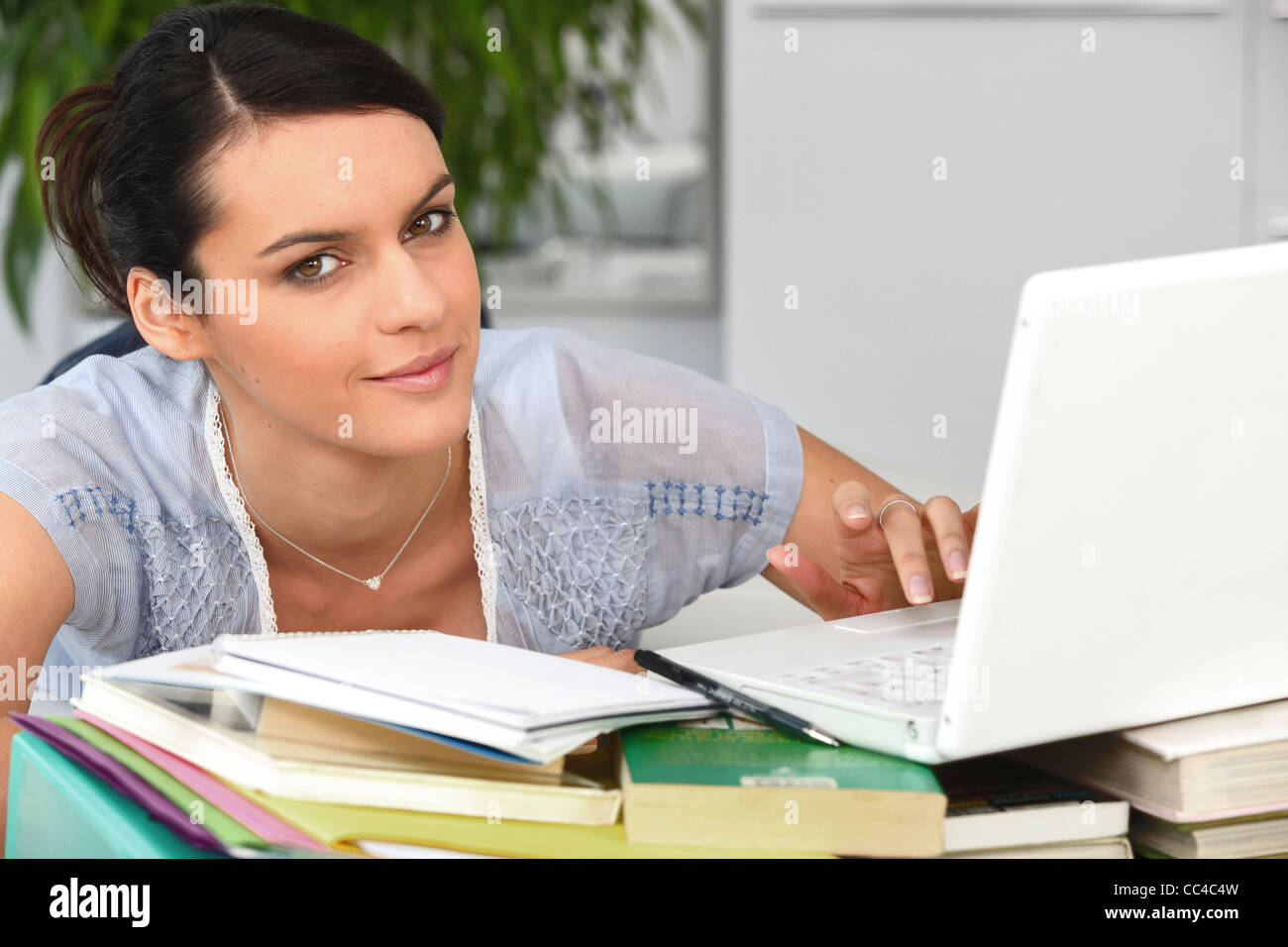 a woman doing computer Stock Photo - Alamy