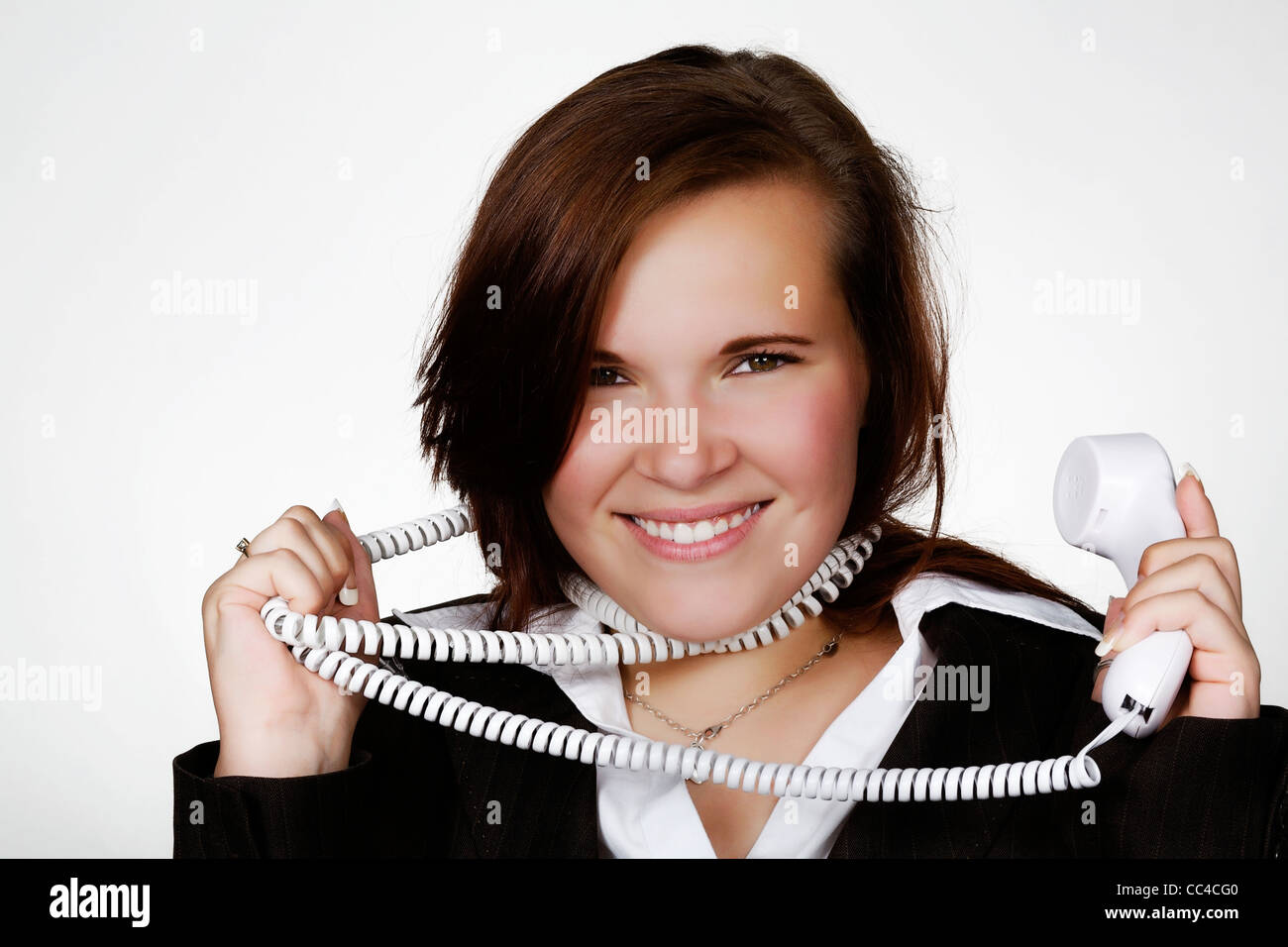 portairt of woman with telephone cord wrapped around face Stock Photo ...