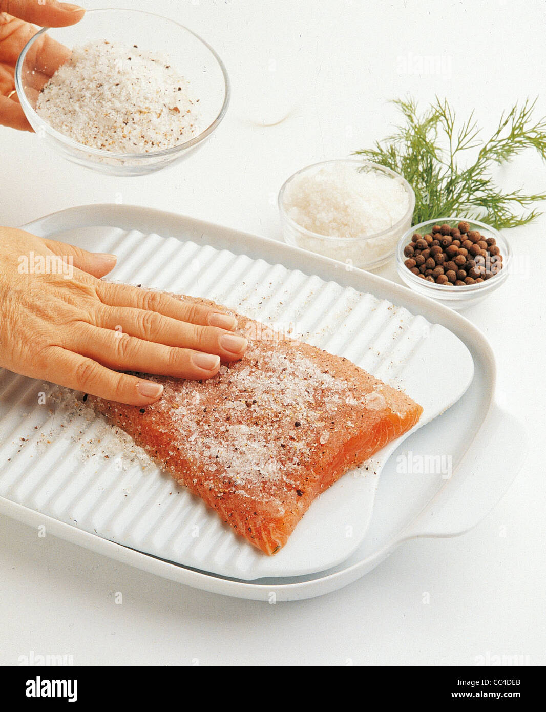 Cuisine: Marinating The Fish (2 Stock Photo - Alamy