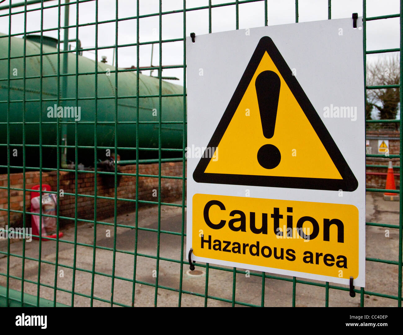 Hazardous Area Caution Sign at oil storage oil depot. Health and Safety ...