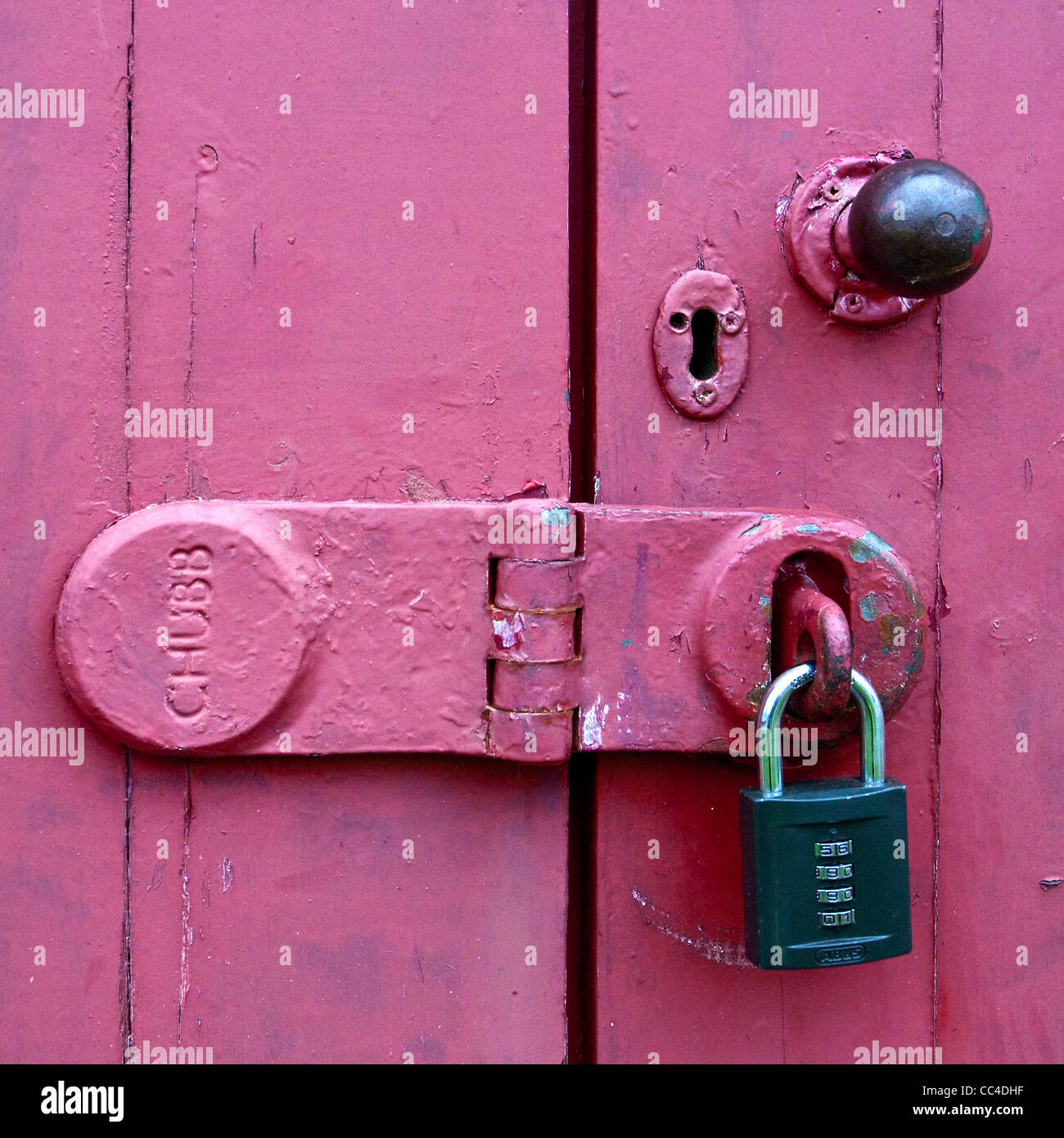 Old Chubb hasp and padlock security locked door Stock Photo - Alamy