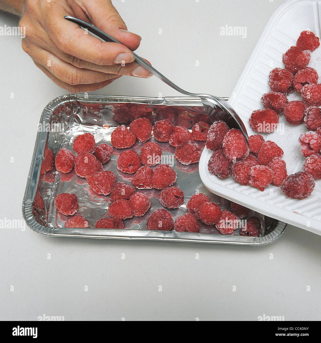Food storage of freezing raspberries 2 hi-res stock photography and ...