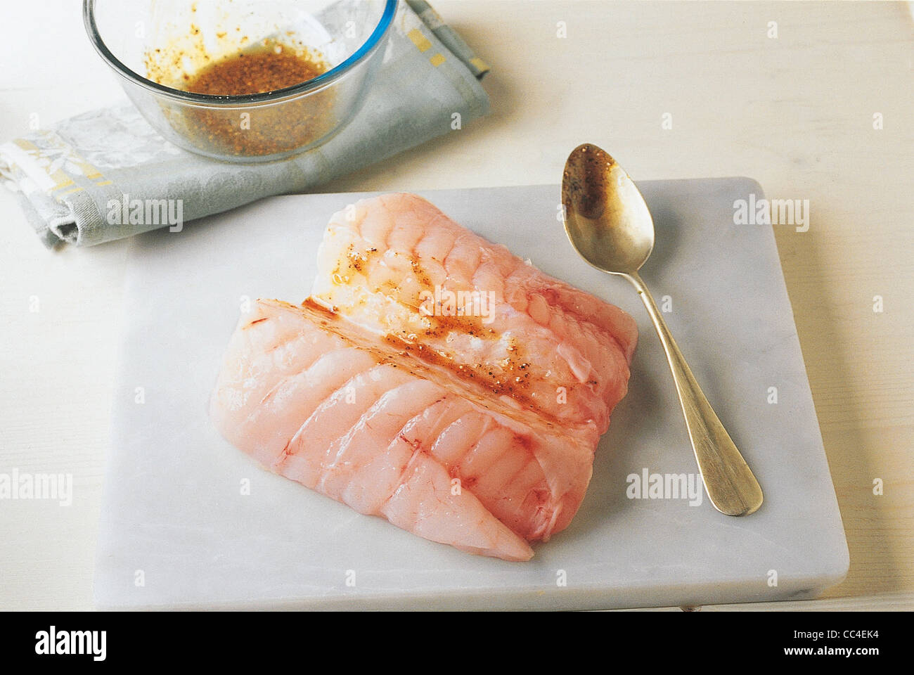 Kitchen: Angler With Roasted Red Onions And Spices (2 Stock Photo - Alamy