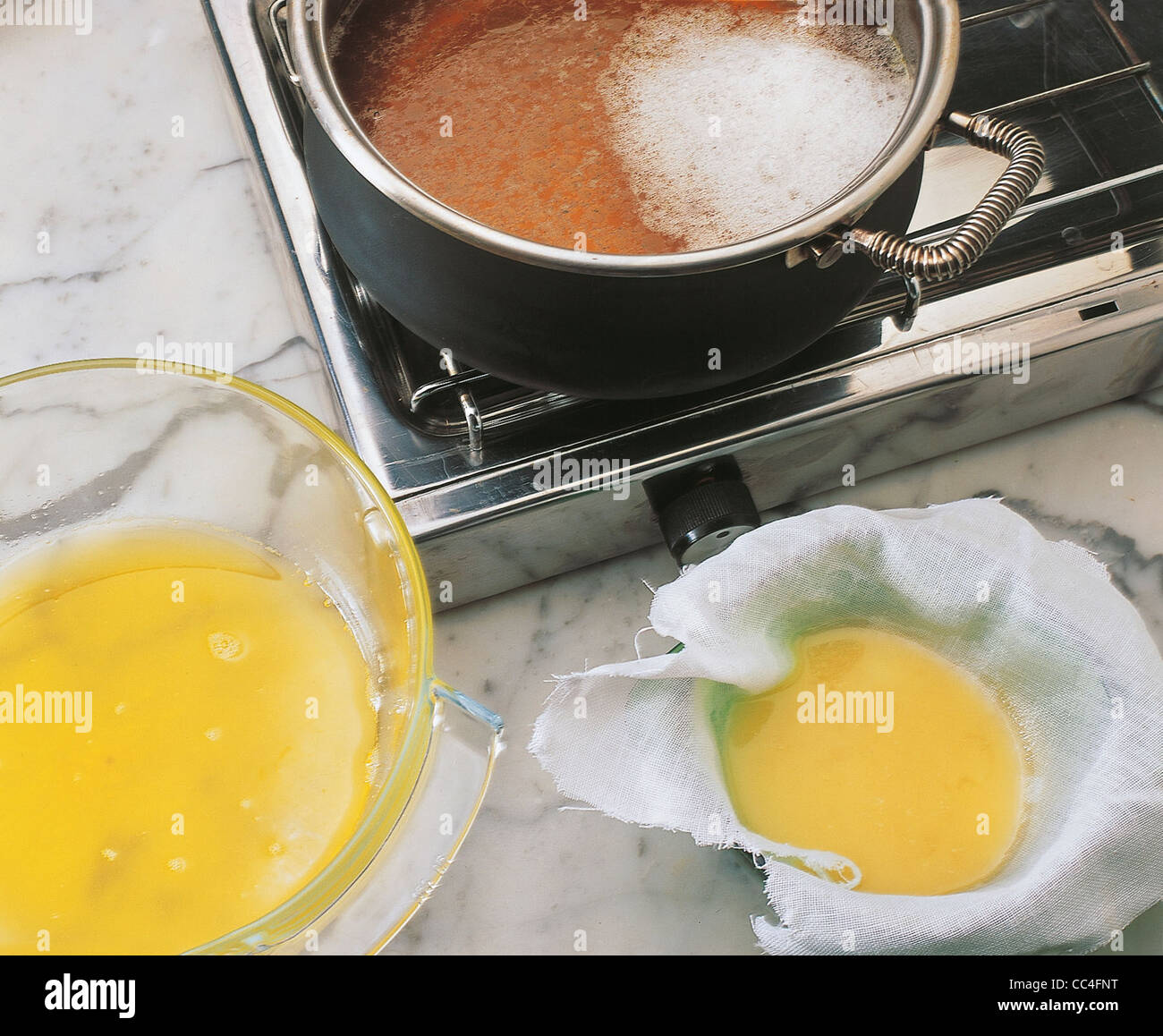 Cuisine: How To Clarify Stock Photo - Alamy