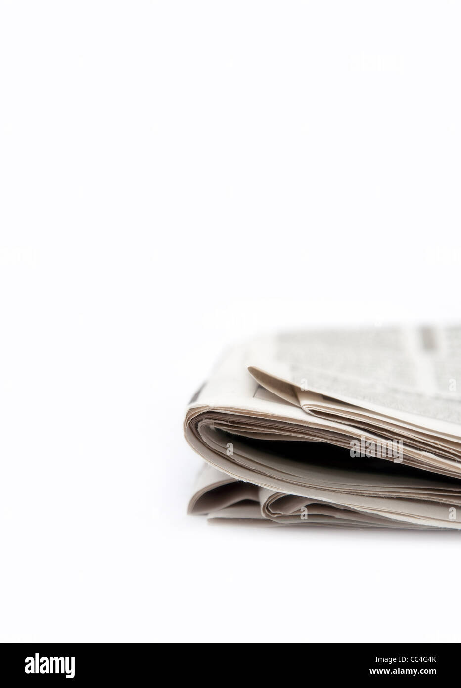 Folded newspaper, close up image Stock Photo - Alamy