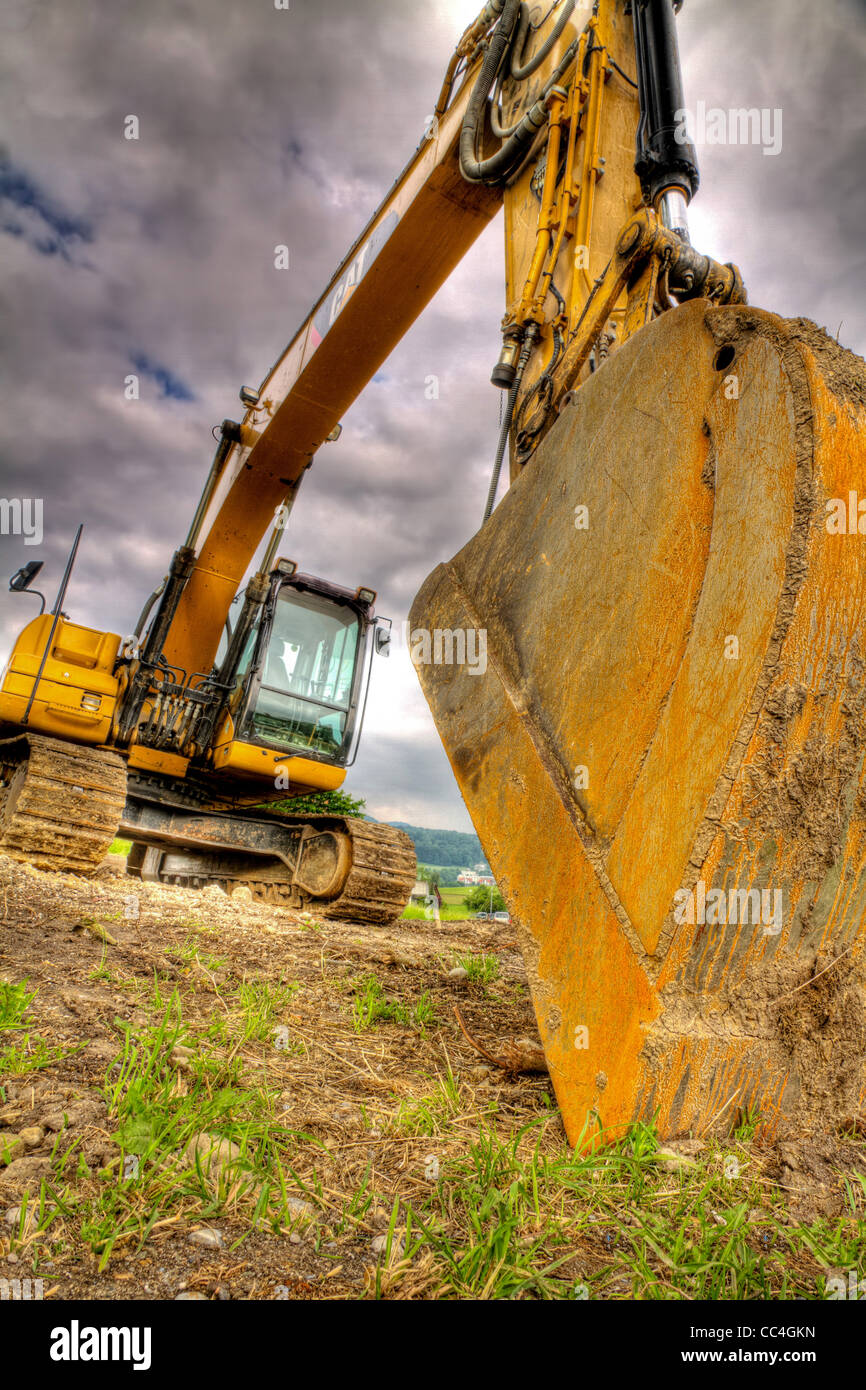digger showing menacing strength, power, size, weight of this road ...