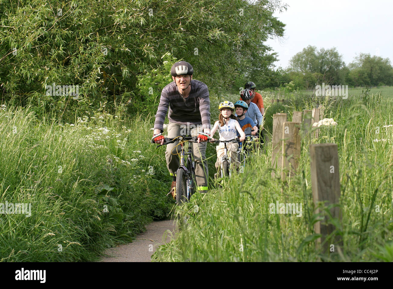 A Family On A Country Cycle Ride Stock Photo - Alamy