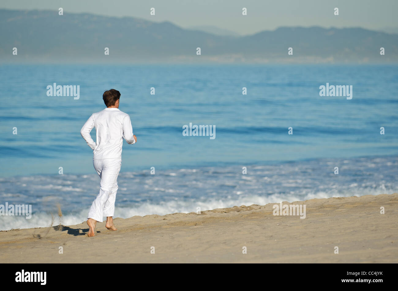 Run man white hi-res stock photography and images - Alamy