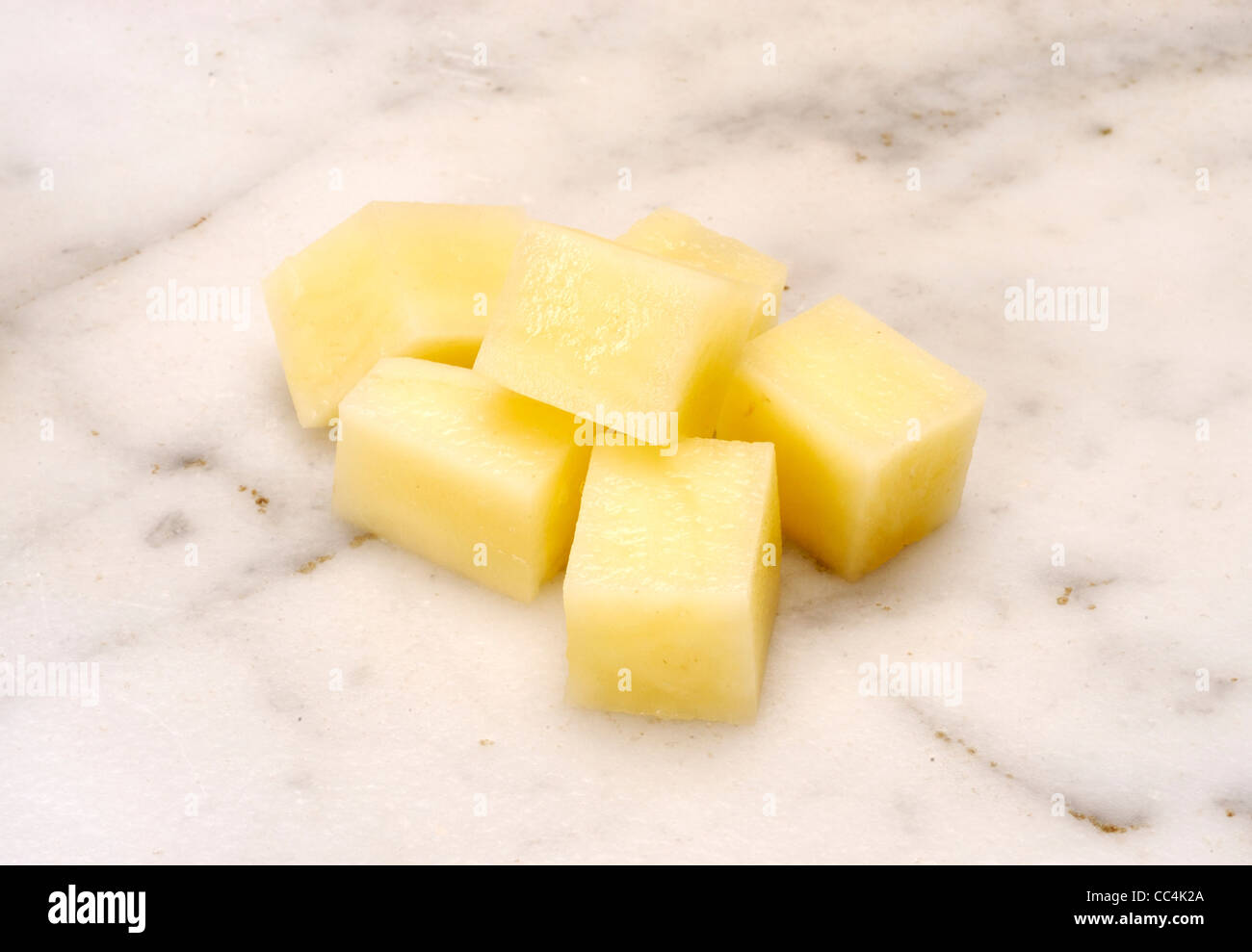 Kitchen cut potatoes cubes potatoes hi-res stock photography and images ...