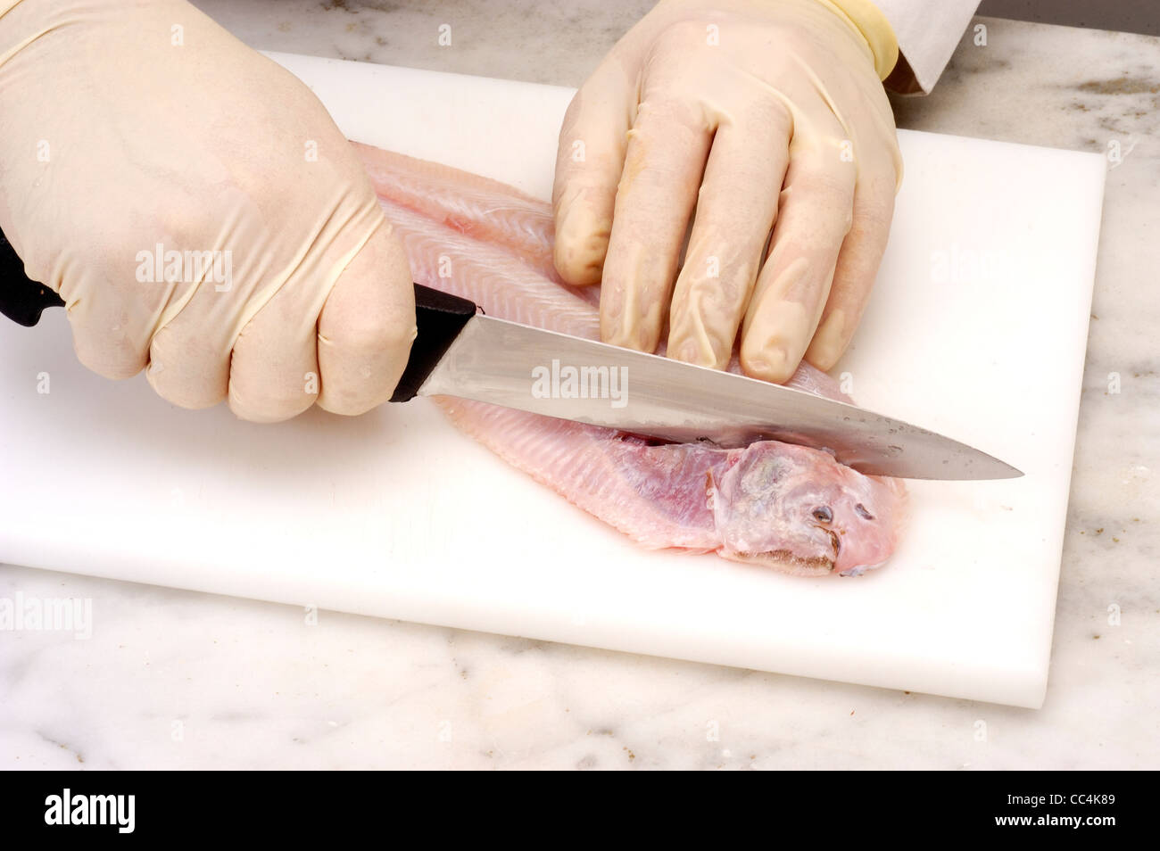 Cuisine: Filleting A Flat Fish. As Transverse Incision At Head Height ...