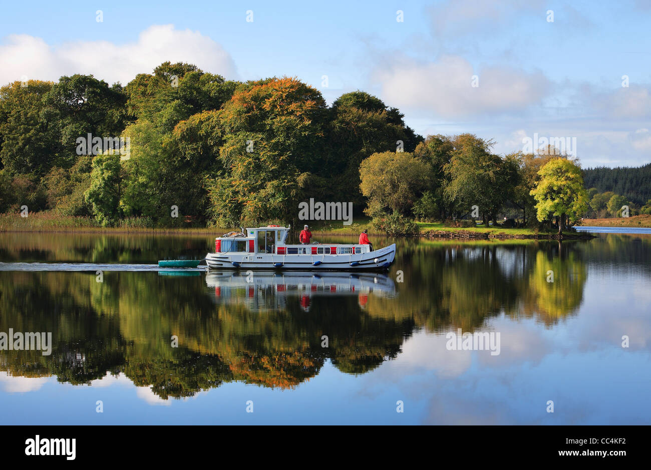 Barge cruising on a lake in Co. Leitrim. Ireland Stock Photo - Alamy
