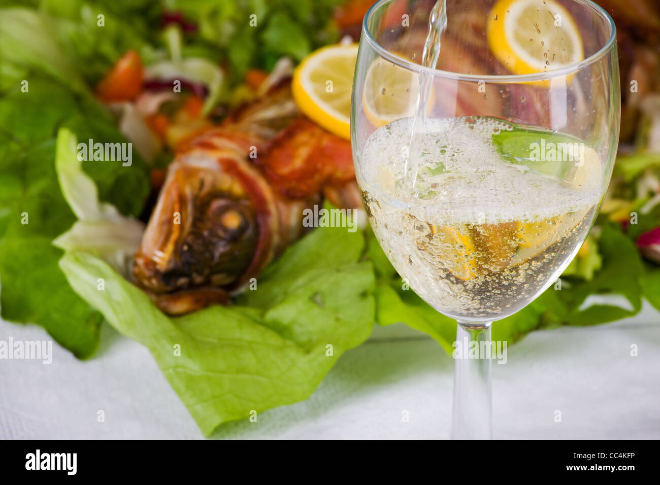 Fish and wine Stock Photo - Alamy