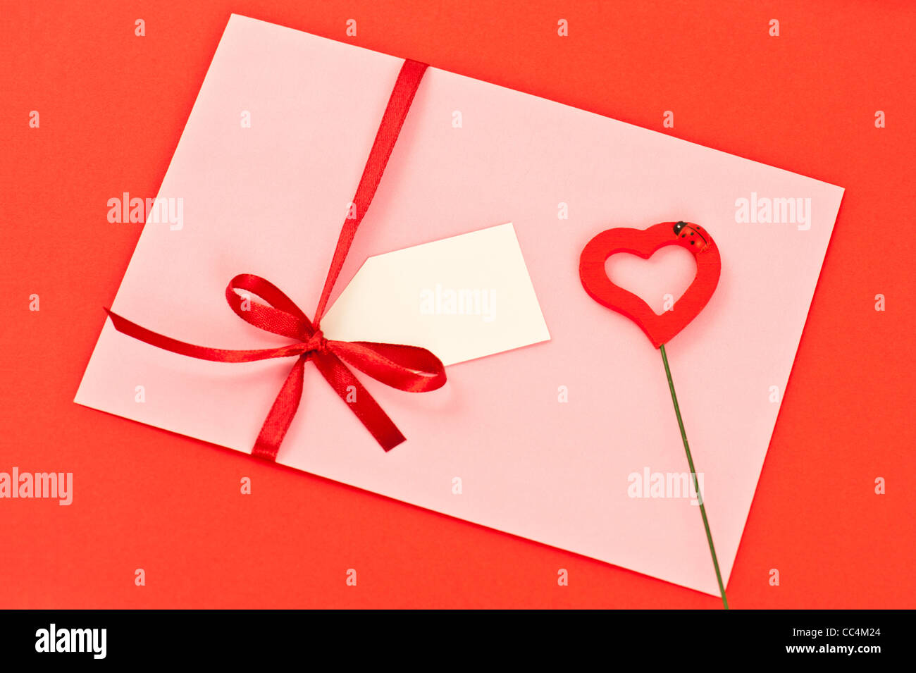Envelope with ribbon hi-res stock photography and images - Alamy