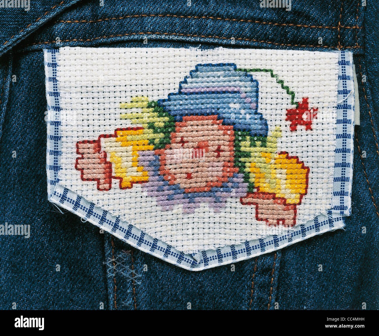 Cross stitch detail jacket jeans hi-res stock photography and images ...