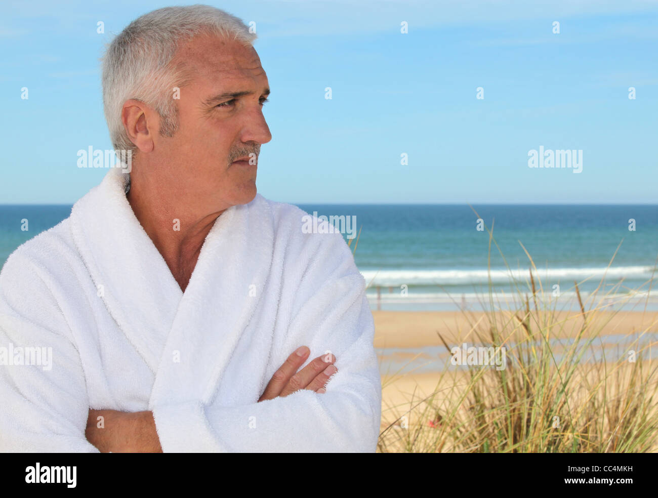 Man by the sea Stock Photo - Alamy
