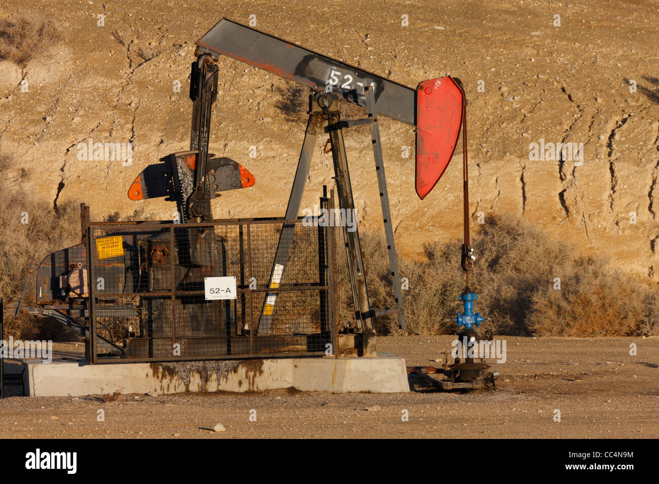 Oil pump on oil well on the Midway-Sunset oil field near Taft ...