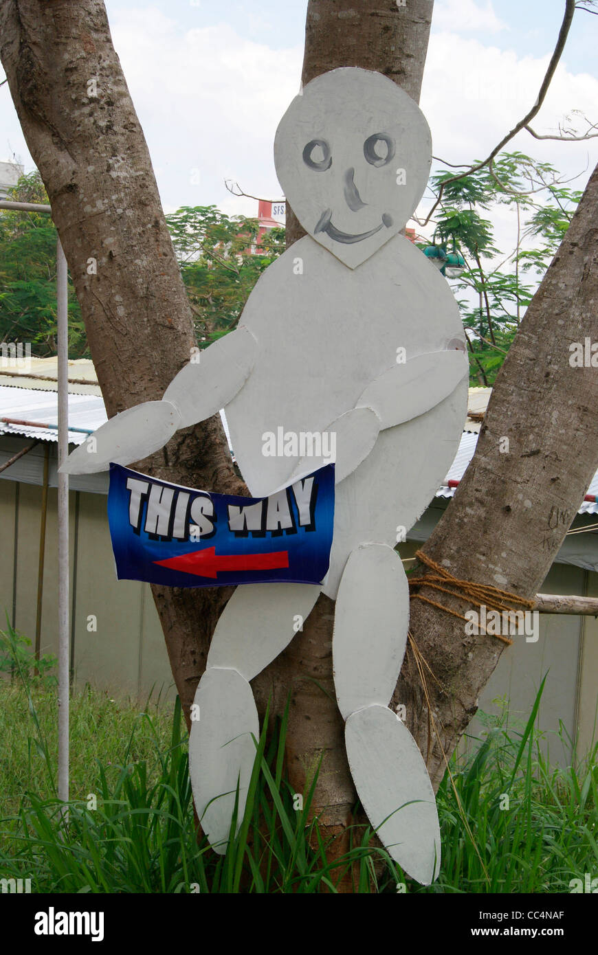 A Card Board man showing the way Stock Photo - Alamy