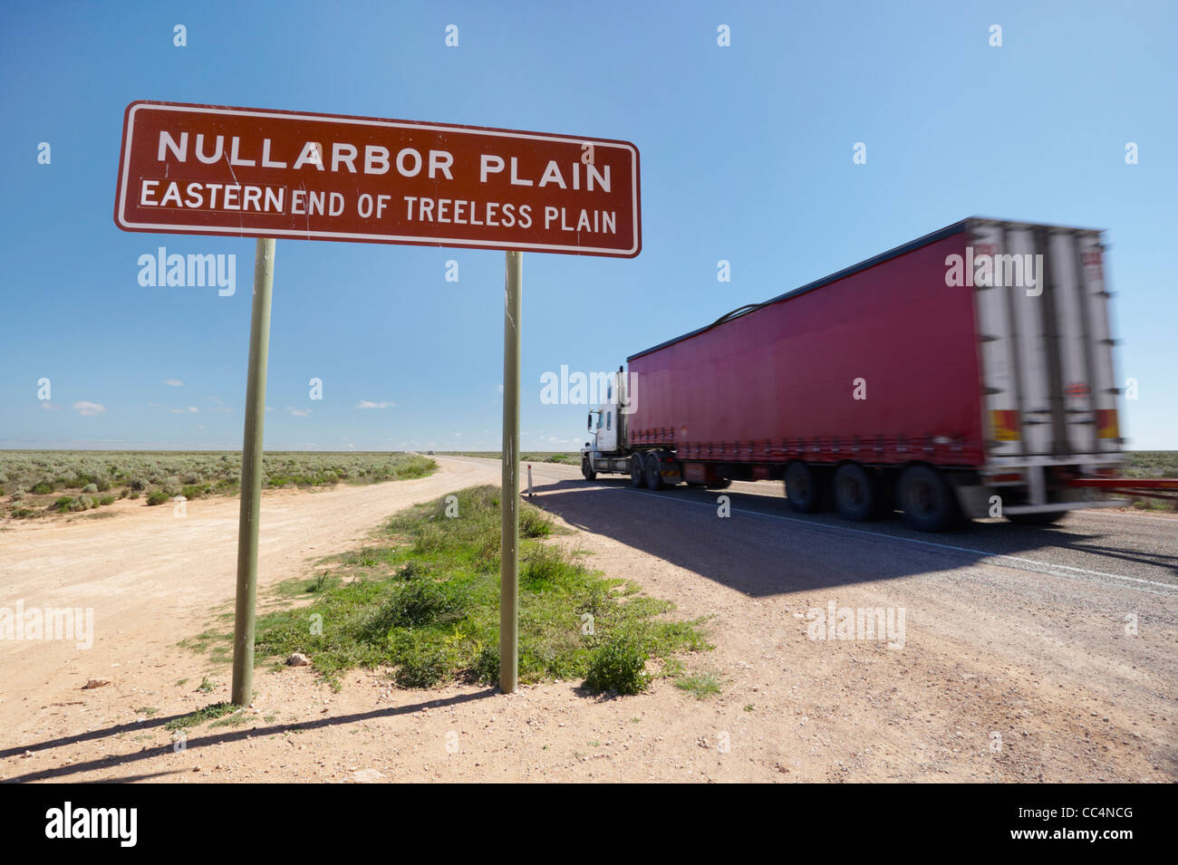 Truck passing Eastern End of Treeless Plain Sign, The Nullarbor Plain ...
