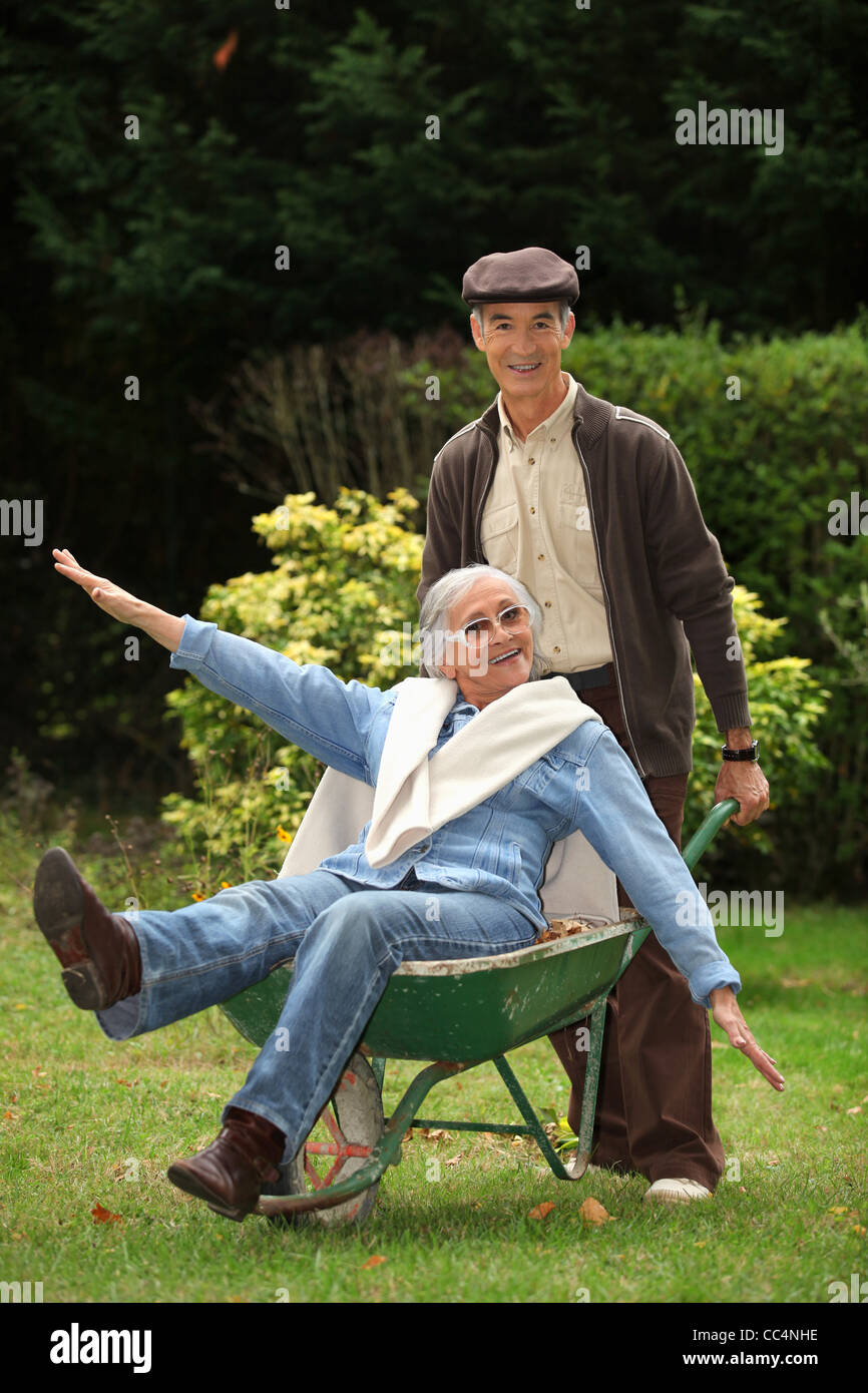 funny grandparents in the garden Stock Photo - Alamy