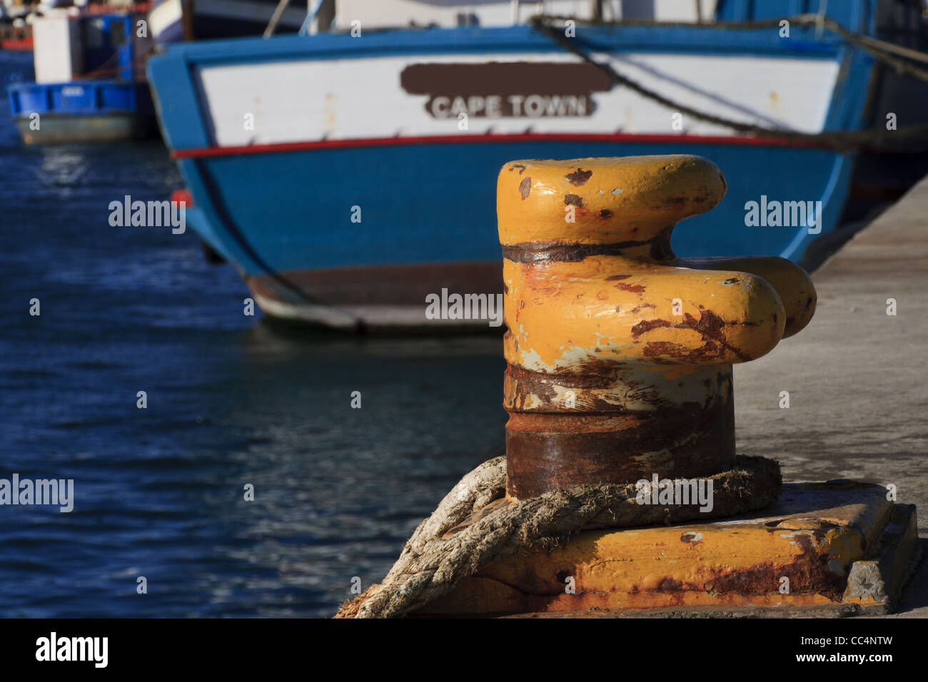 Trawler with yellow mooring in Cape Town Stock Photo - Alamy