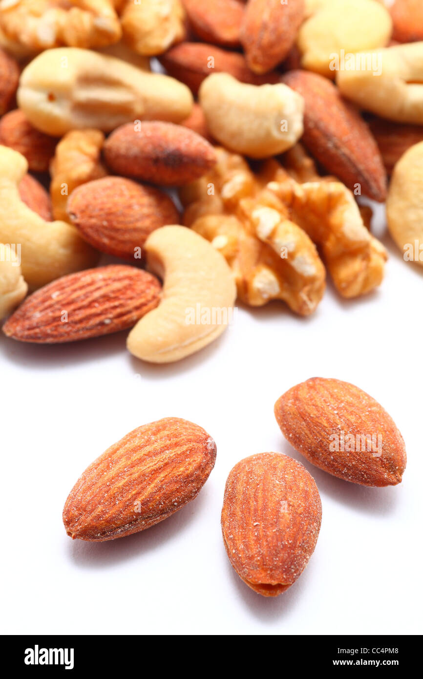 Mixed nuts on white background Stock Photo - Alamy