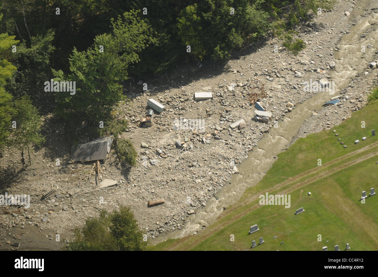 Coffins are visible in this cemetery after flood water from tropical ...
