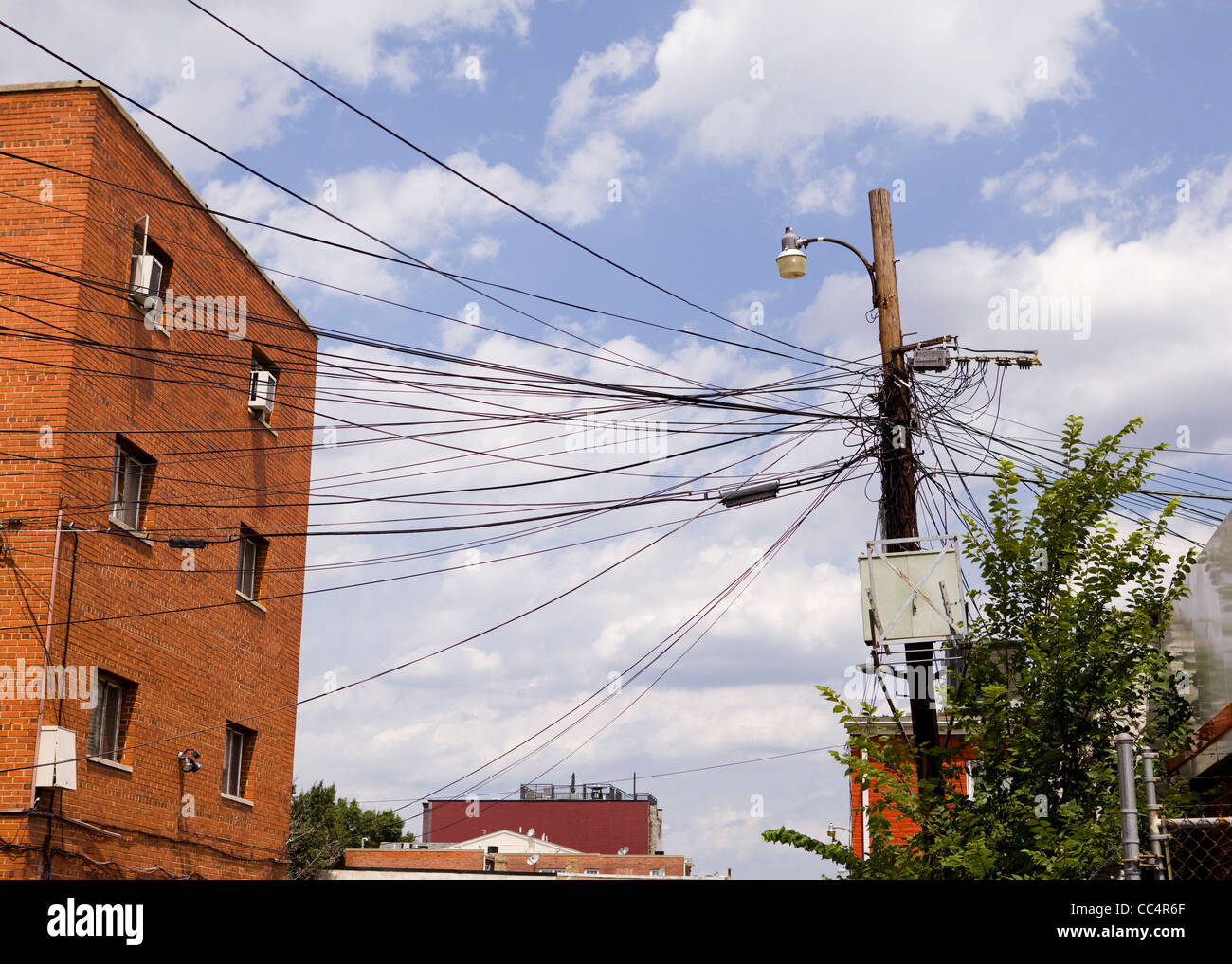 messy electric power lines Stock Photo - Alamy