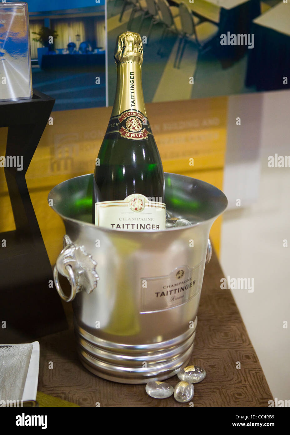 Champagne bottle on ice Stock Photo - Alamy