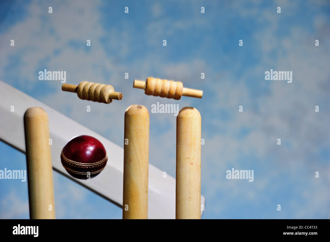 Ball hits wicket in a game of cricket Stock Photo - Alamy