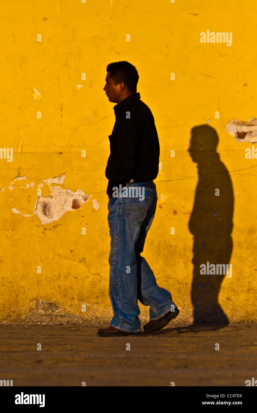 mexico yellow shadow man Stock Photo - Alamy