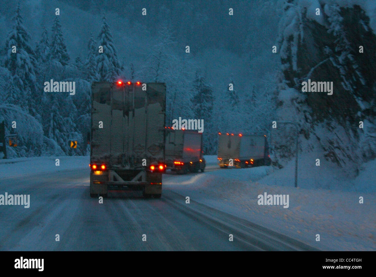 40,524.02083 3 three 18 wheelers trucks curve night snowstorm slick ice ...