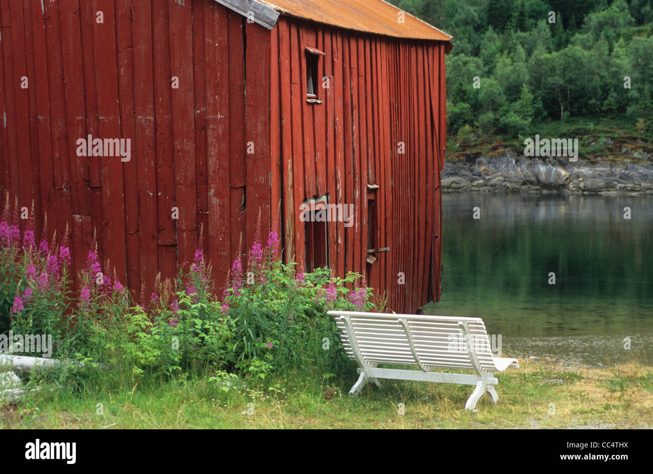 White bench and red warehouse, Storgata Street, Mosjoen, Nordlands ...