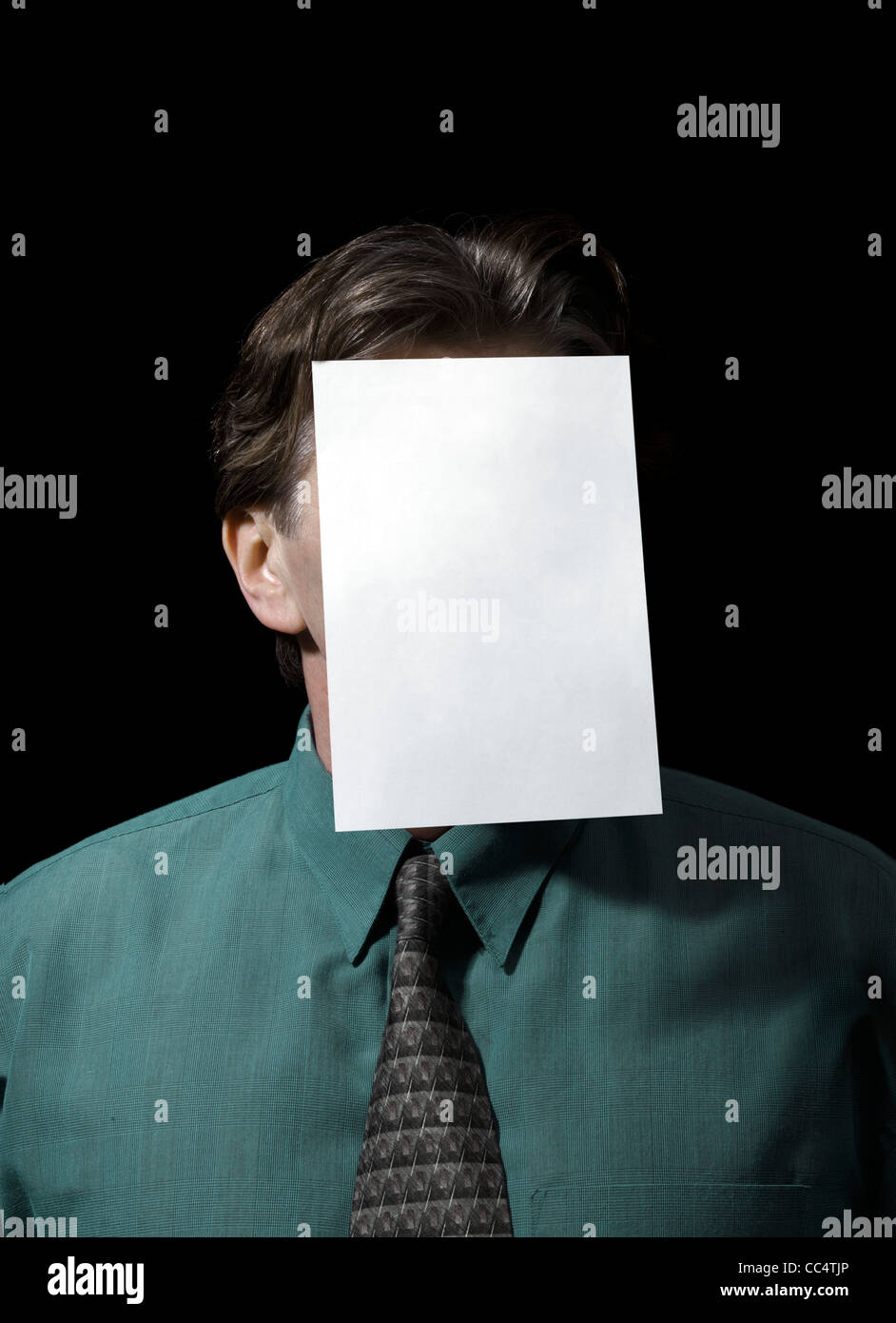 Portrait of a Businessman with blank Paper on Face Stock Photo - Alamy