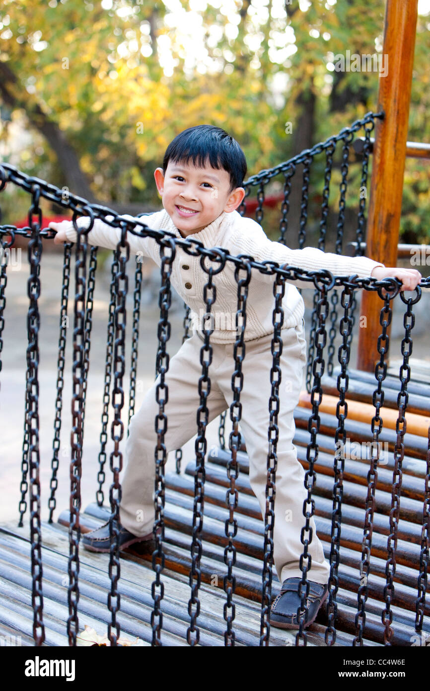 Chinese children playing on bridge hi-res stock photography and images ...