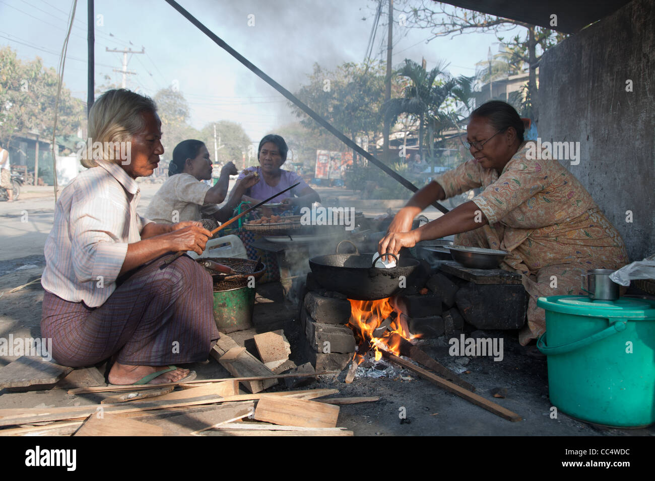 Street food kitchen. Cooking on the street on open fireplace for ...