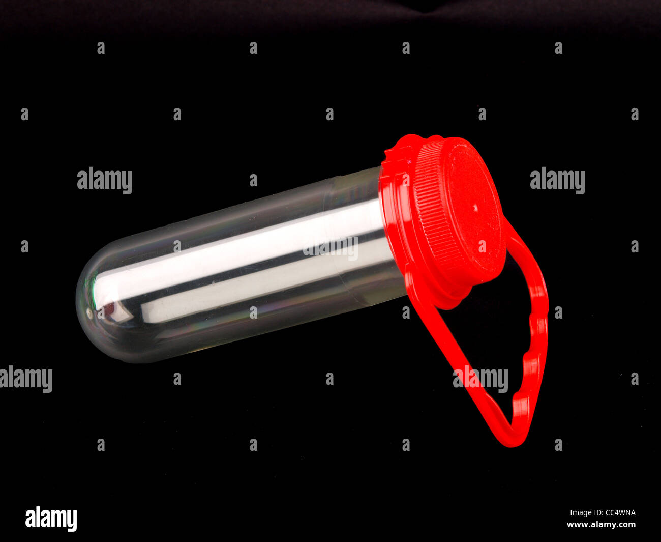 plastic preform isolated on the black background Stock Photo - Alamy