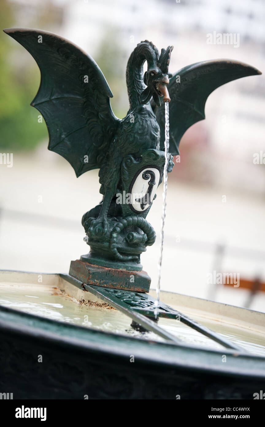 Basilisk fountain with dragon holding the city coat of arms, Basel ...