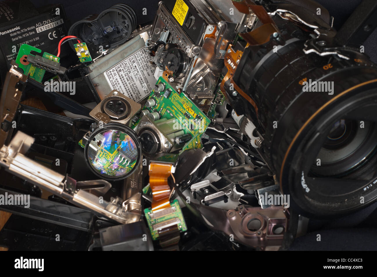 Component parts of a broken high resolution 3 chip digital video camera ...