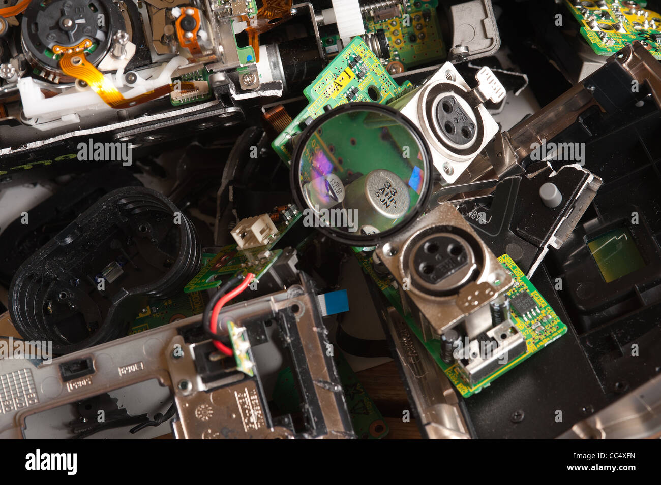 Component parts of a broken high resolution 3 chip digital video camera ...