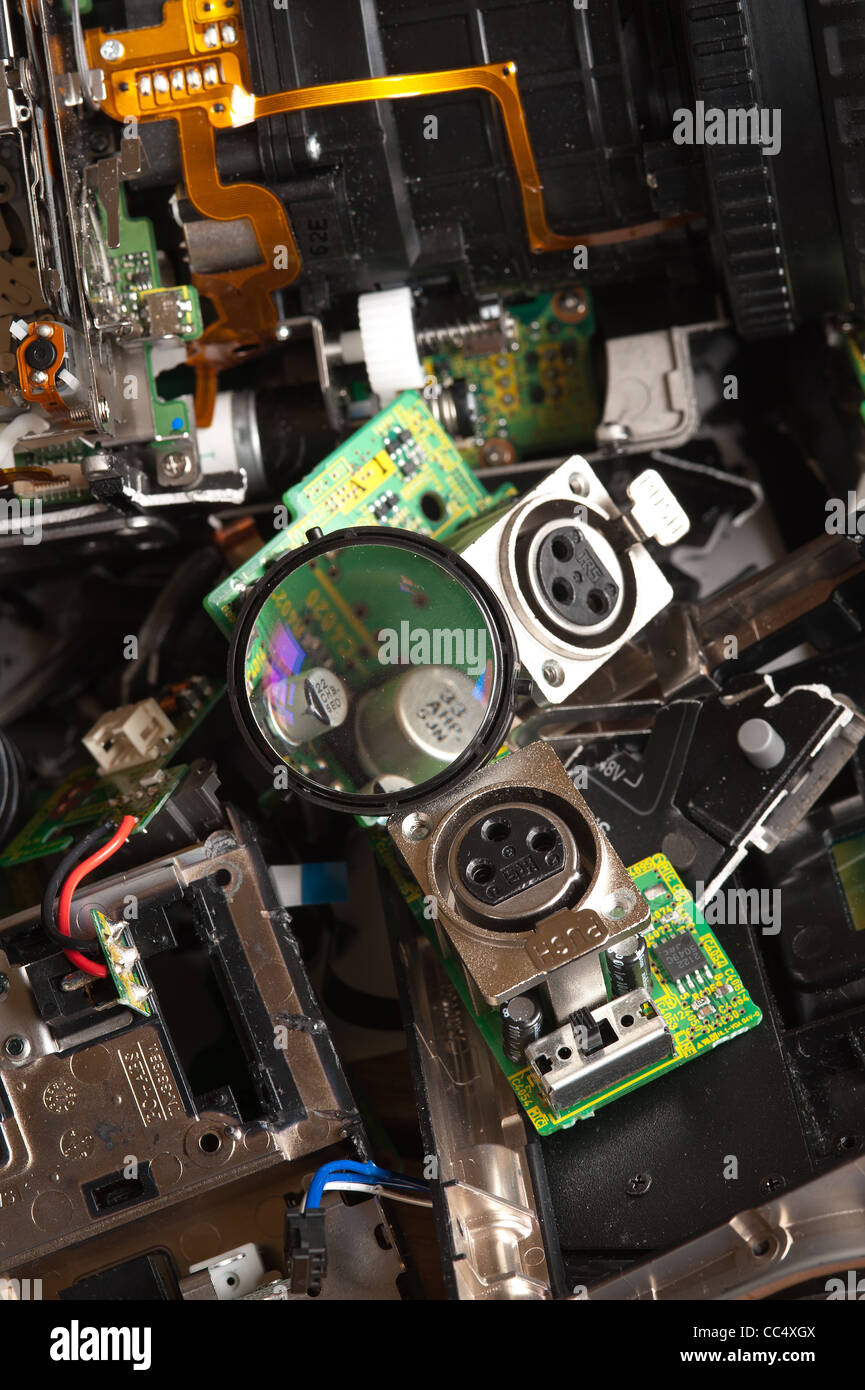 Component parts of a broken high resolution 3 chip digital video camera ...