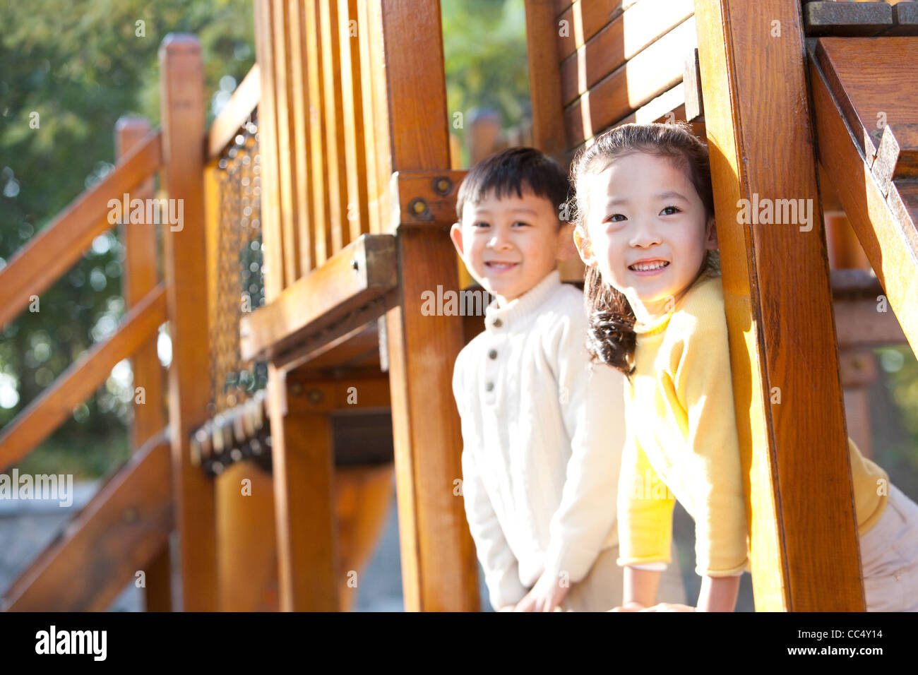 Children playing in playground toys Stock Photo - Alamy