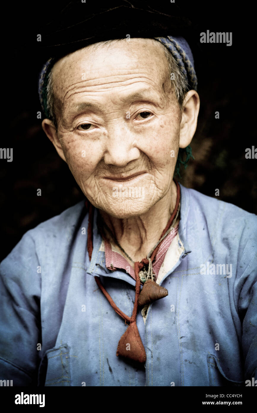 Portrait of a traditional White Hmong tribeswoman at the remote village ...