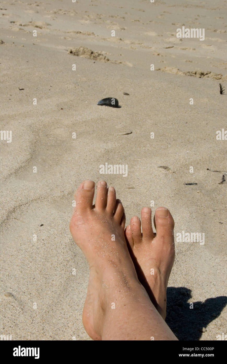 Sandy beach feet hi-res stock photography and images - Alamy