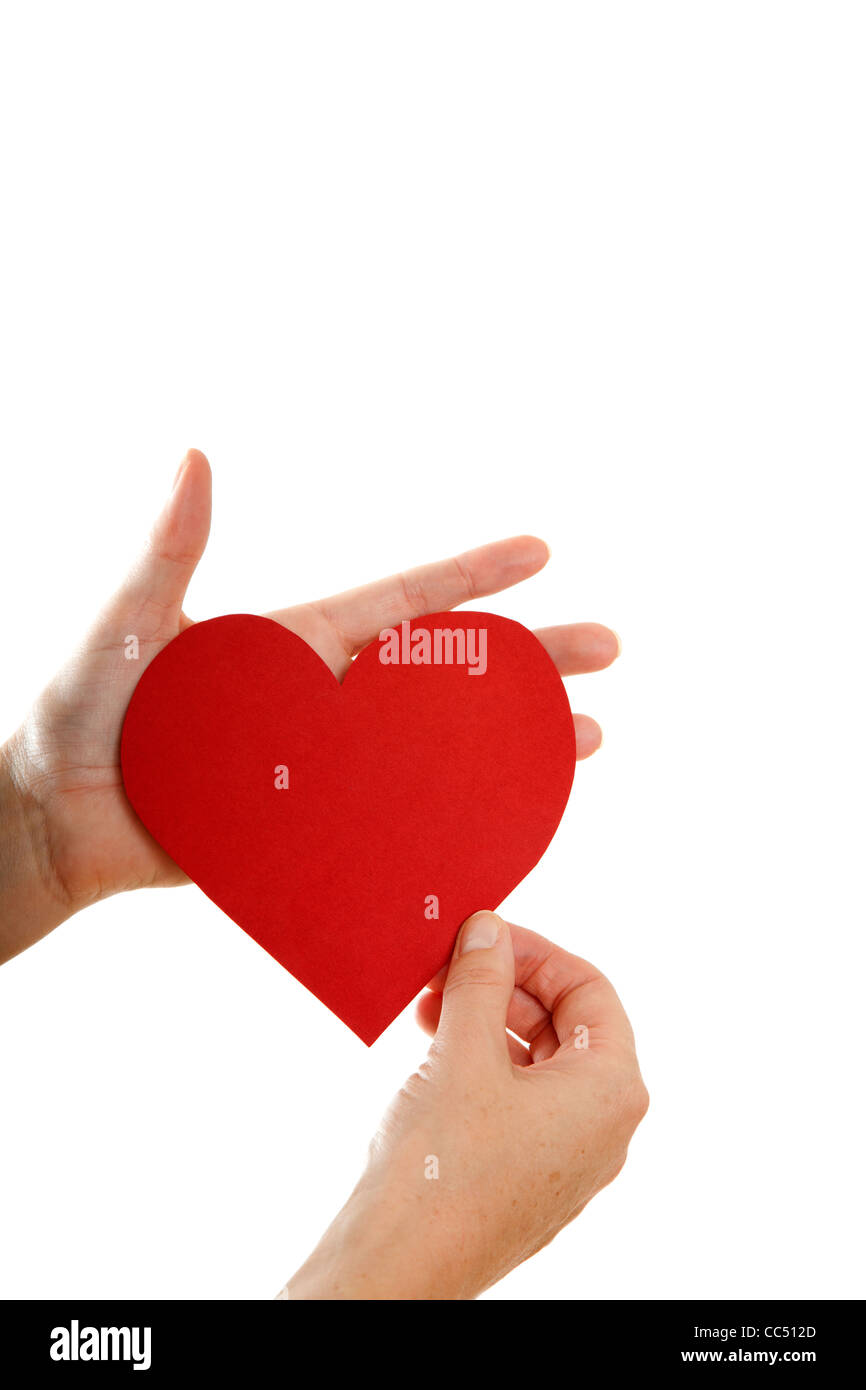 Hands hold red paper hi-res stock photography and images - Alamy