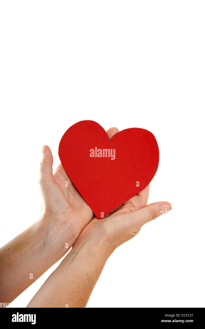 Hands holding heart Stock Photo - Alamy