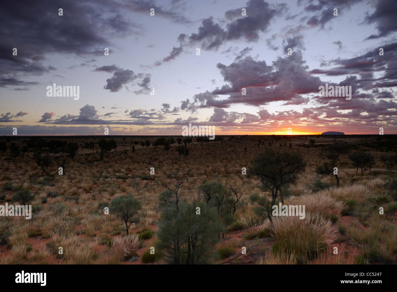 Sunrise at Ayers Rock; Uluru and the rising sun, Uluru-Kata Tjuta ...