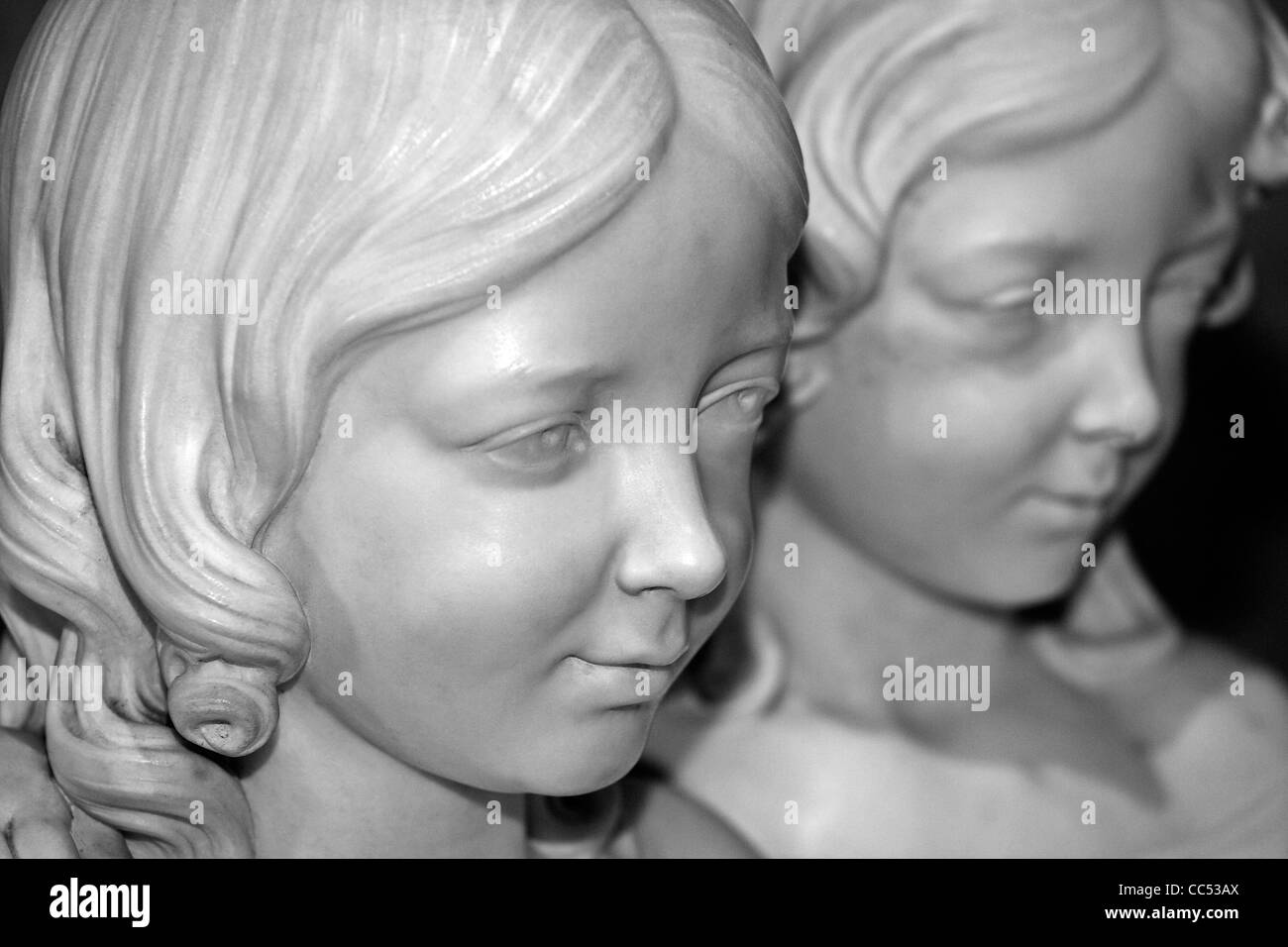 Marble sculpture of two young girls, sisters, in a church in North ...
