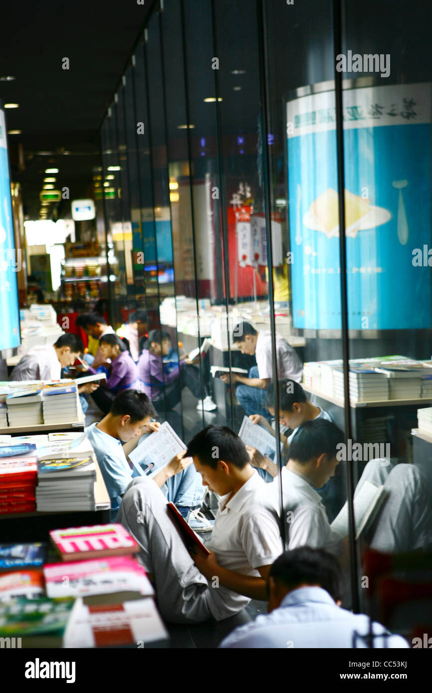 People reading book in a bookstore, Beijing, China Stock Photo - Alamy