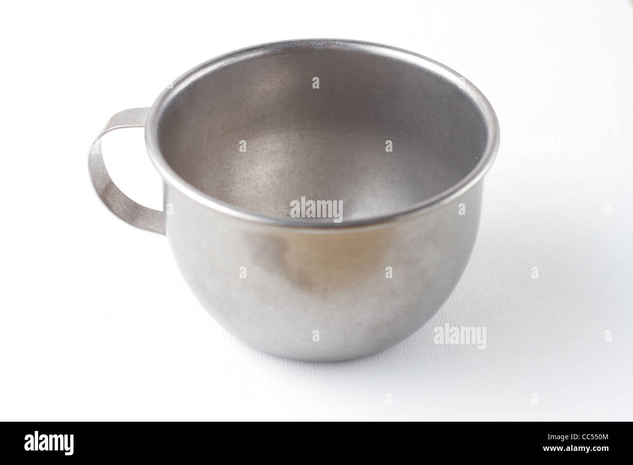 Prison tin cup Stock Photo - Alamy