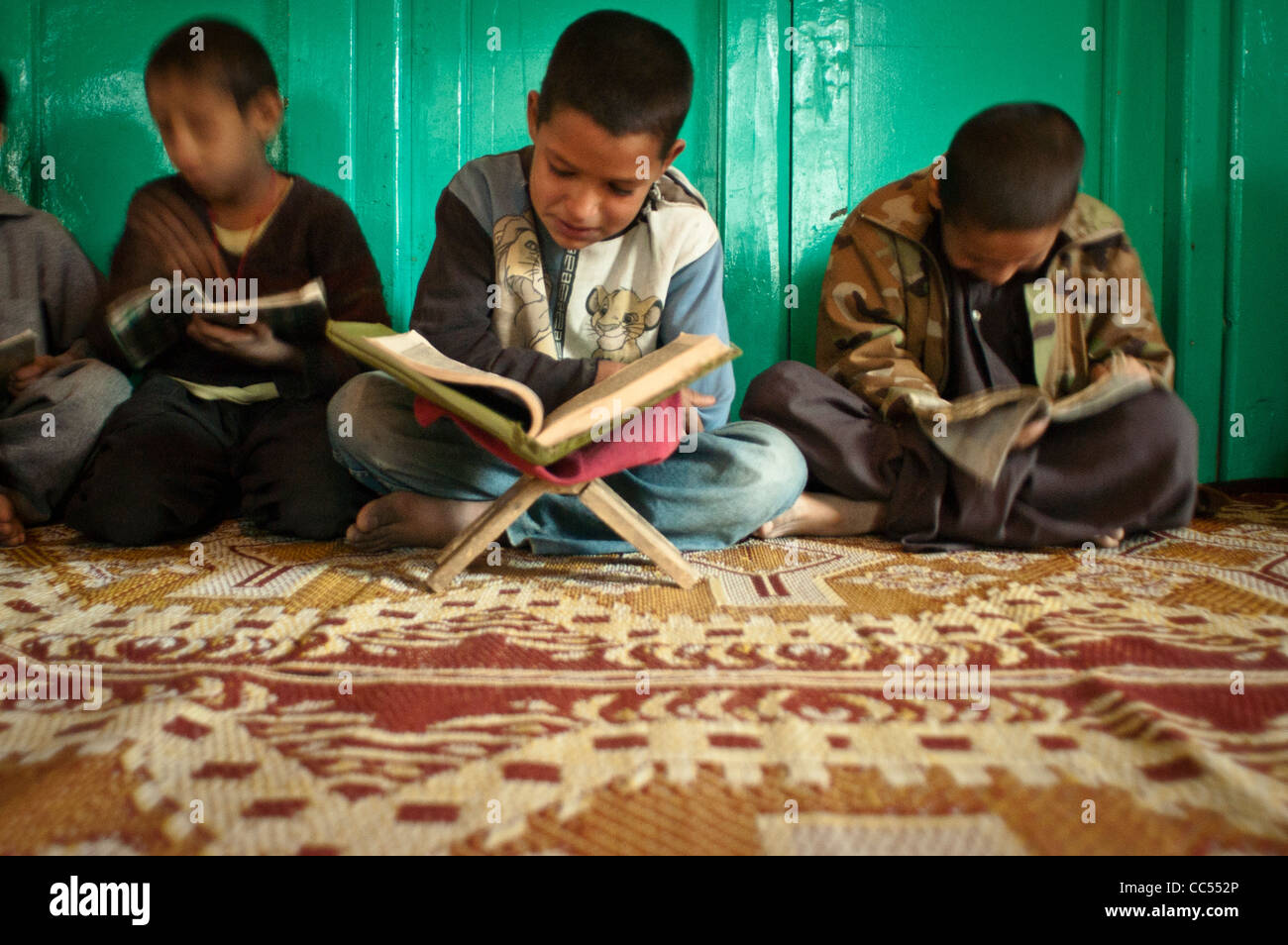 Boys learn from texts in a maktab school in Kabul, Afghanistan, October ...